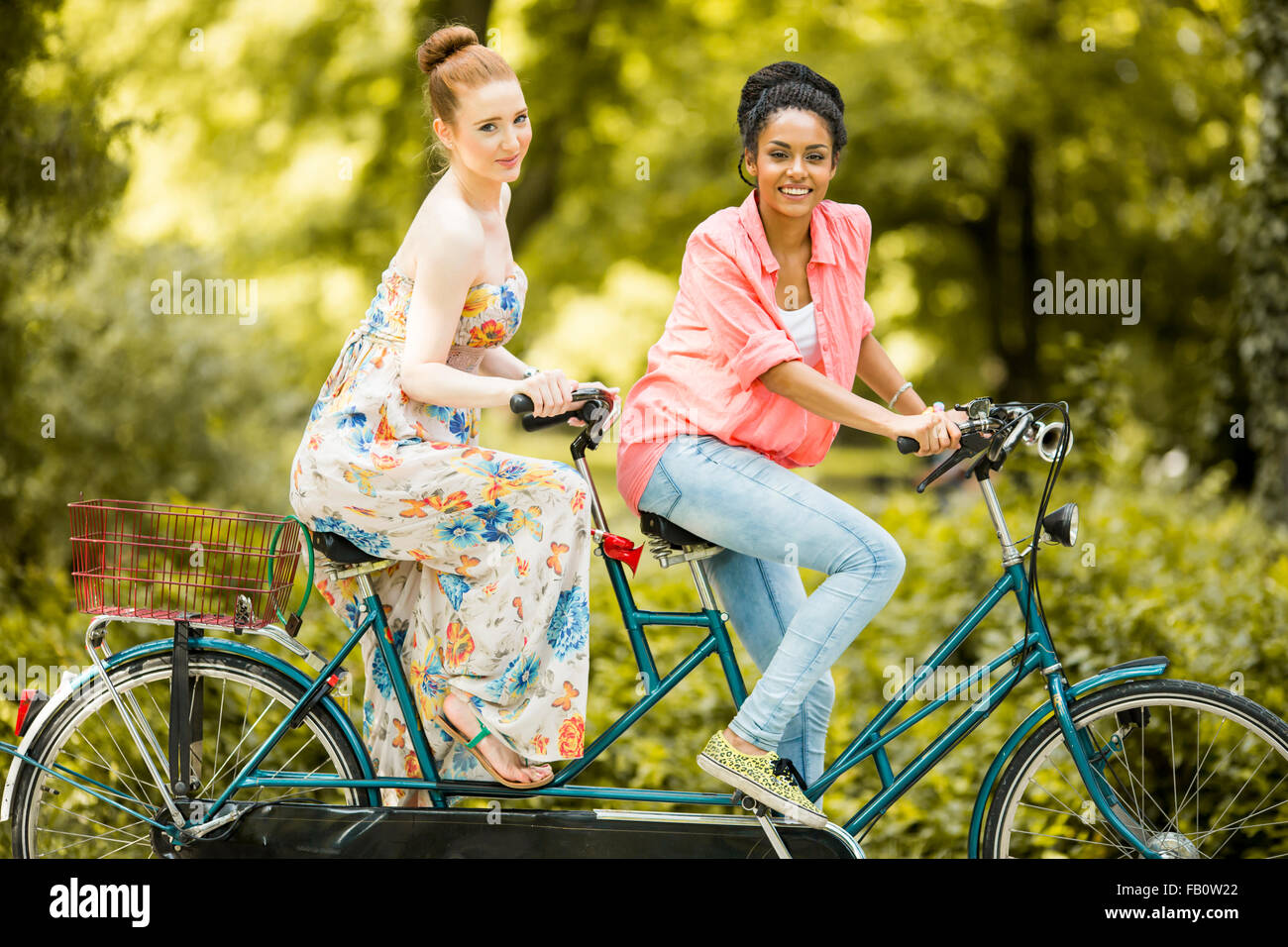 Beautiful women on bicycle hi-res stock photography and images - Alamy