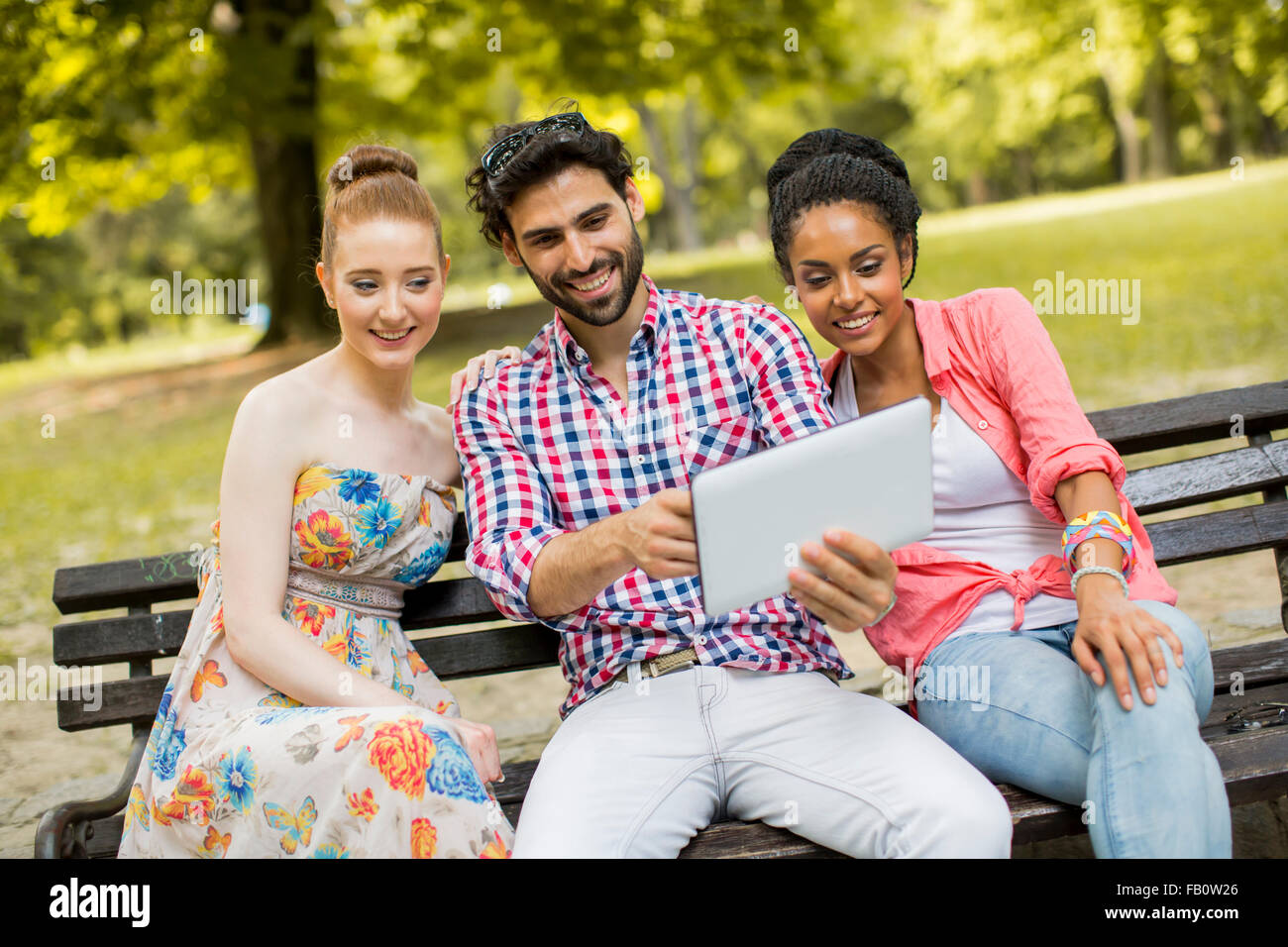 Girl on park bench hi-res stock photography and images - Alamy