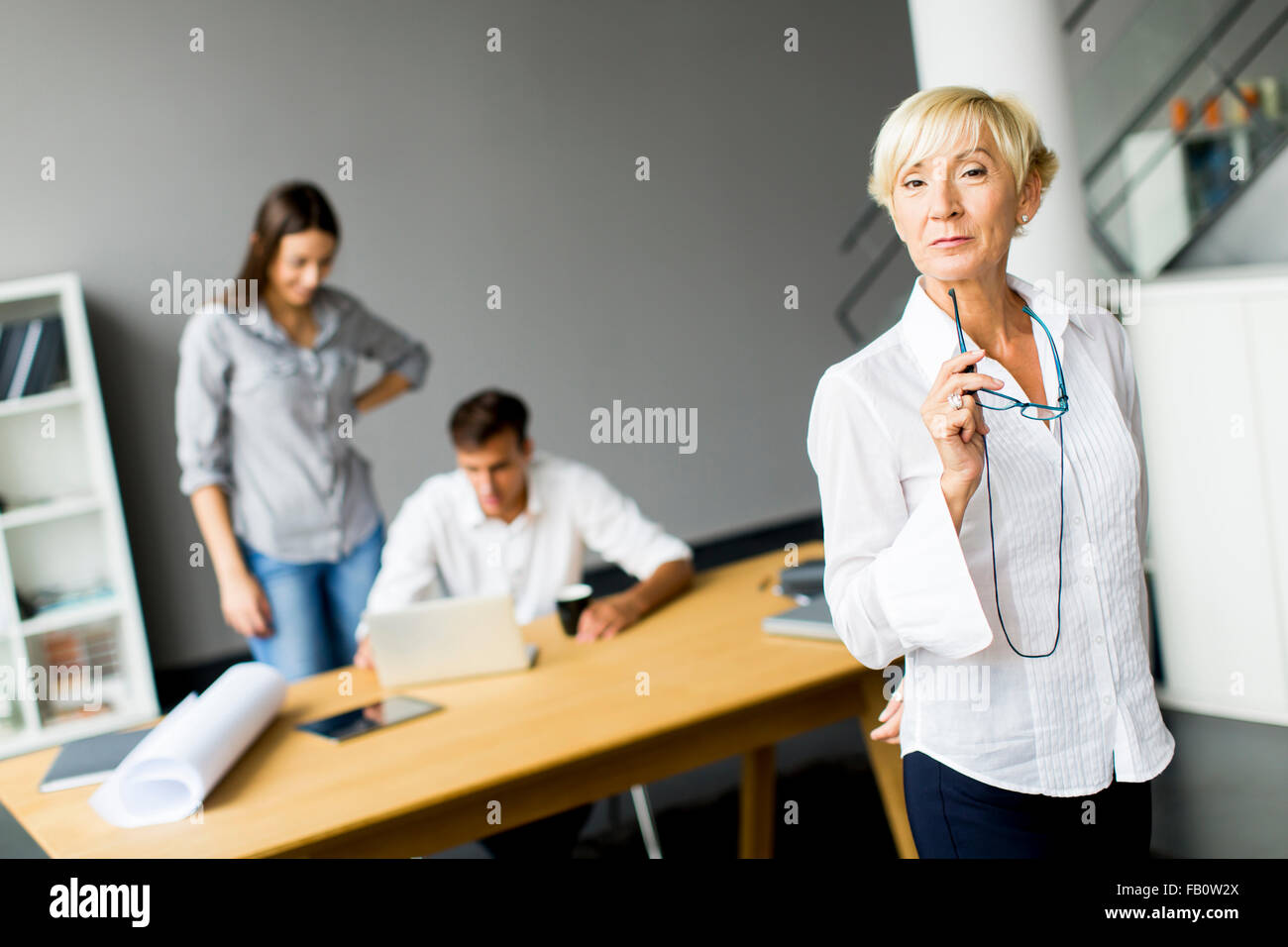 Group businessperson in office teamwork hi-res stock photography and ...