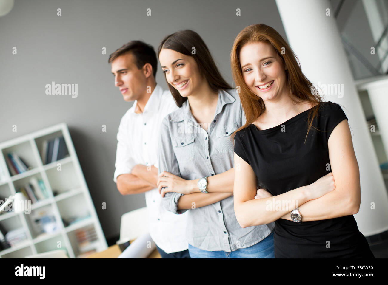 Young people in the office Stock Photo - Alamy
