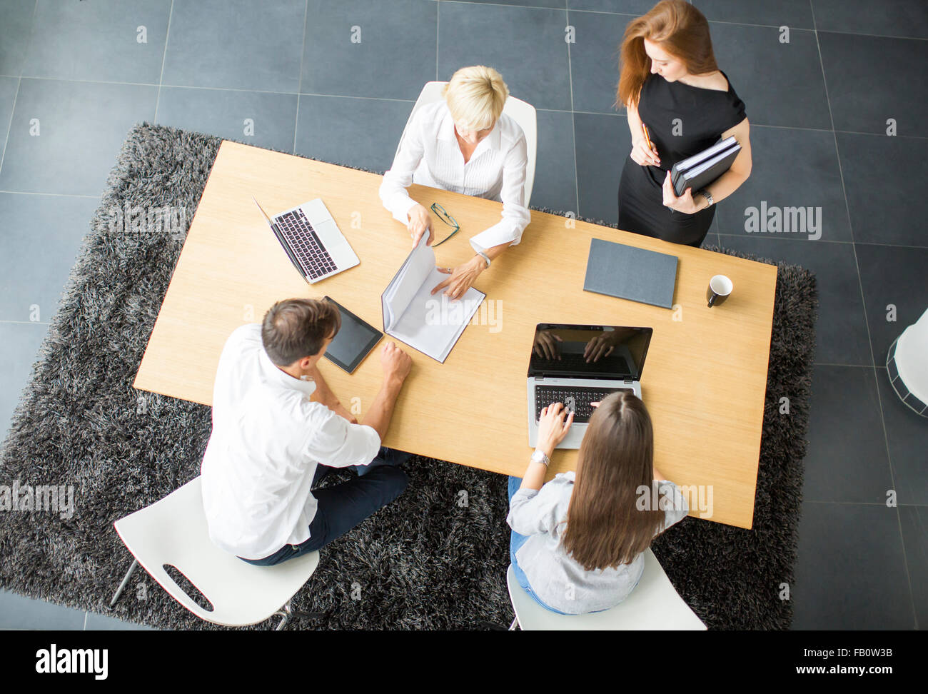 People in the office Stock Photo - Alamy