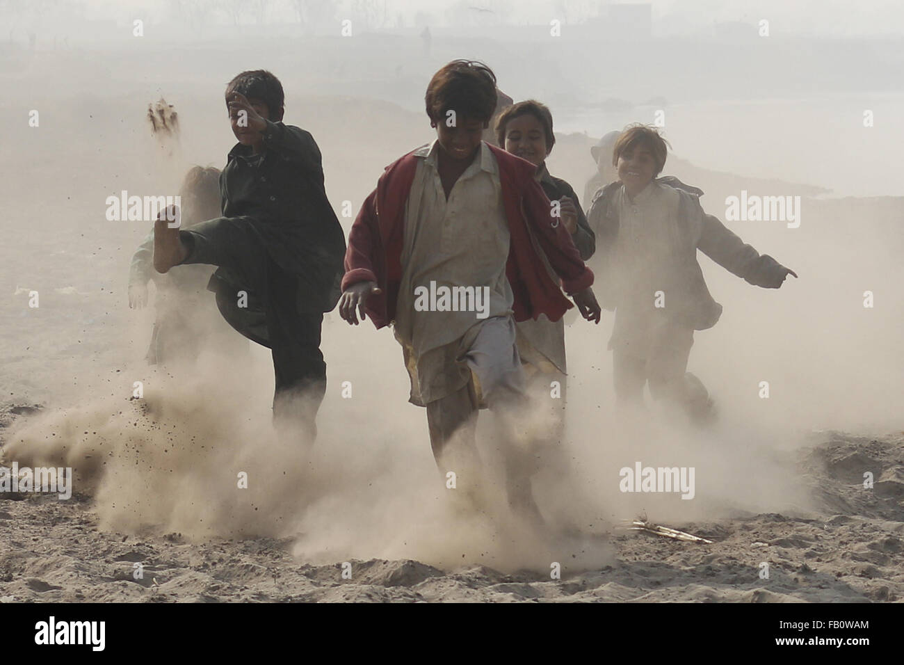 Lahore, Pakistan. 07th Jan, 2016. Pakistani gypsy children playing at ...
