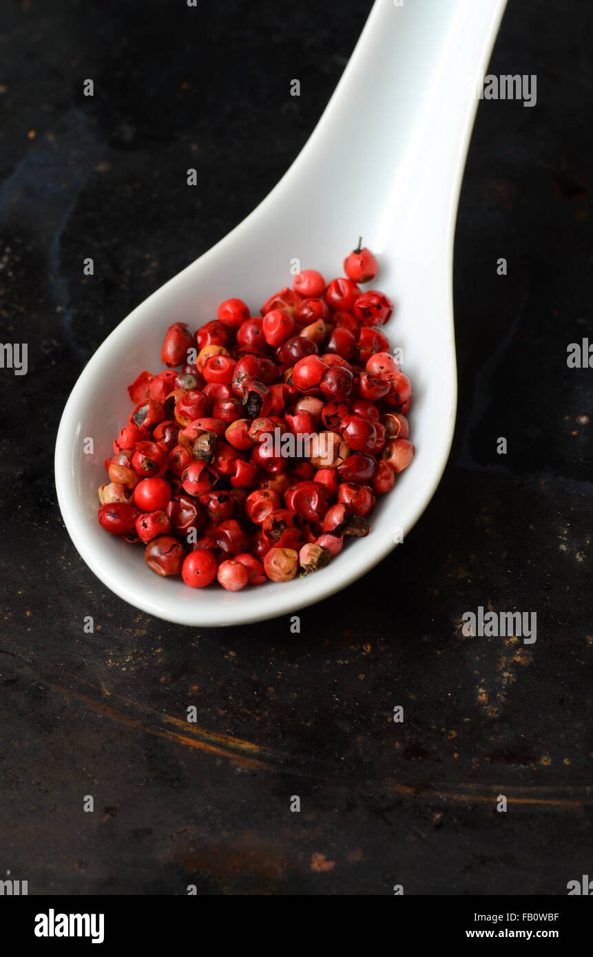 Pink peppercorns, also called "Brazil Pepper", close up image Stock ...