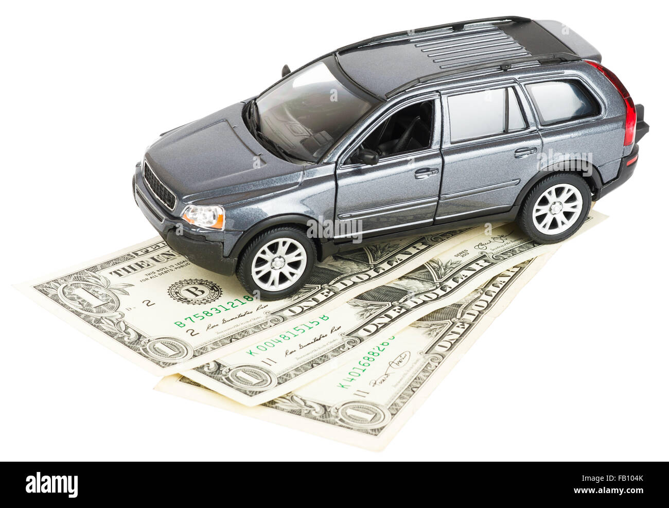 Car on money Stock Photo - Alamy