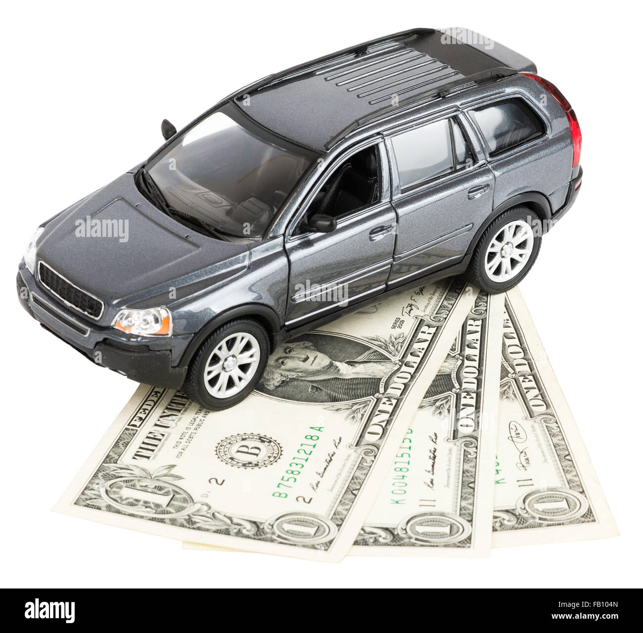 Car standing on money Stock Photo - Alamy