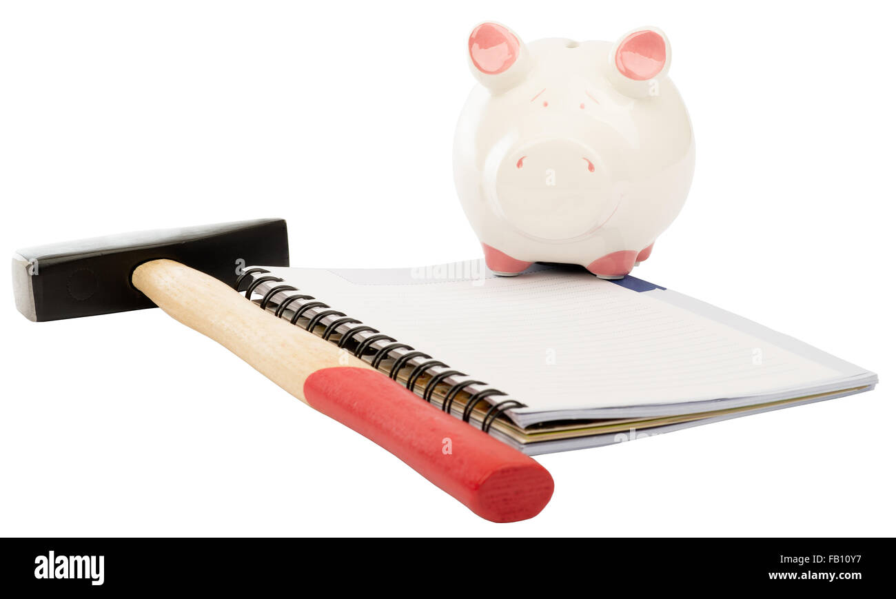 Piggy bank with hammer Stock Photo - Alamy