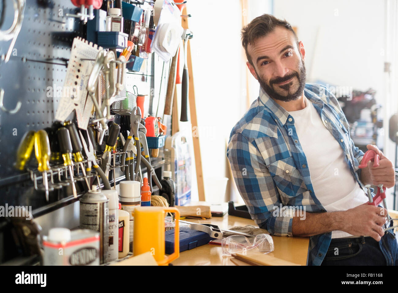 Portrait of man in workshop Stock Photo - Alamy