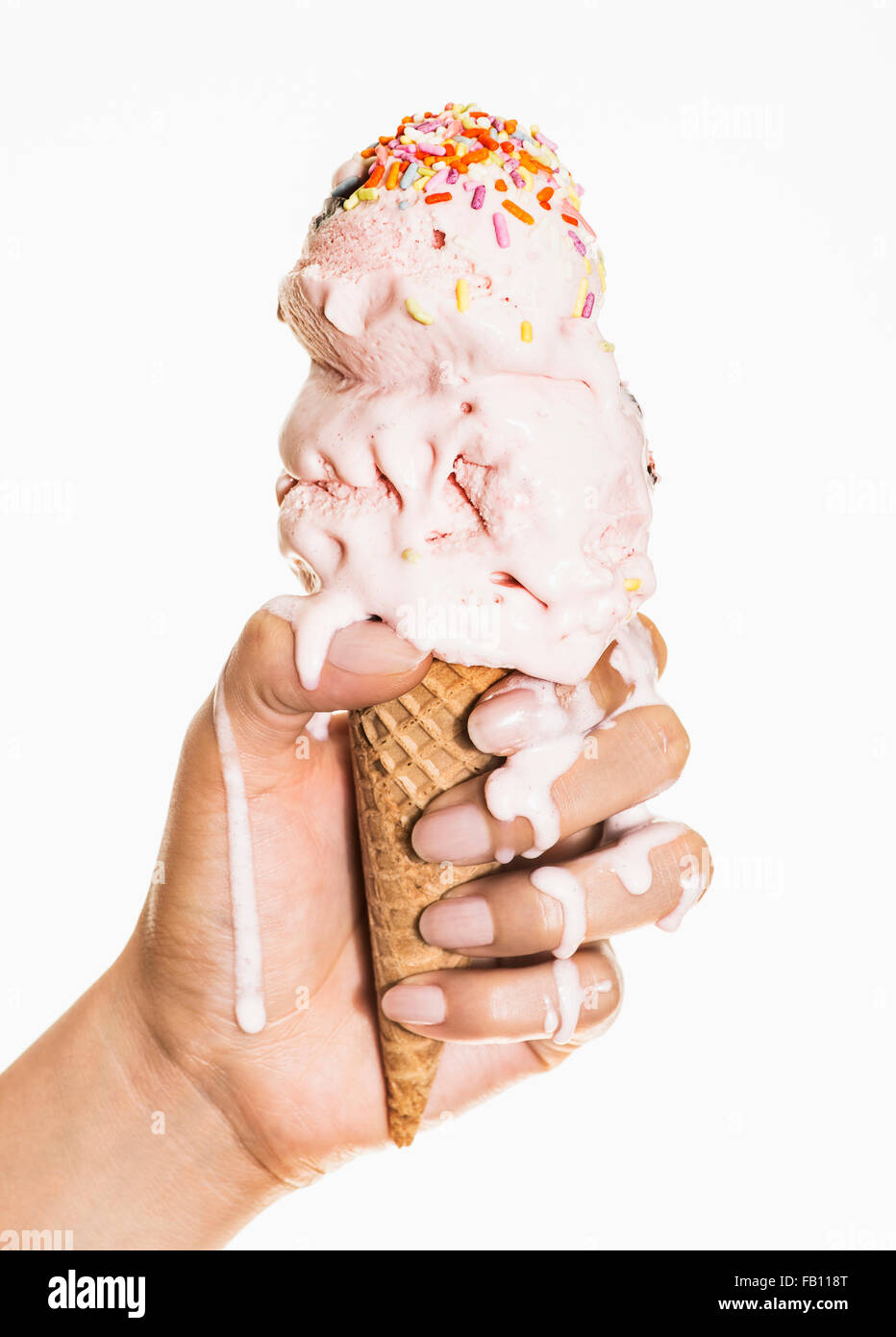 Female hand holding ice cream Stock Photo - Alamy