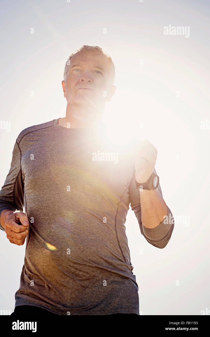 Man jogging outdoors Stock Photo - Alamy