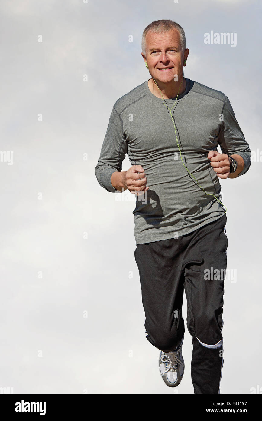 Man jogging outdoors Stock Photo - Alamy