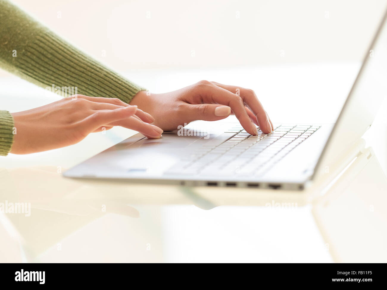 Woman hands laptop on desk hi-res stock photography and images - Alamy