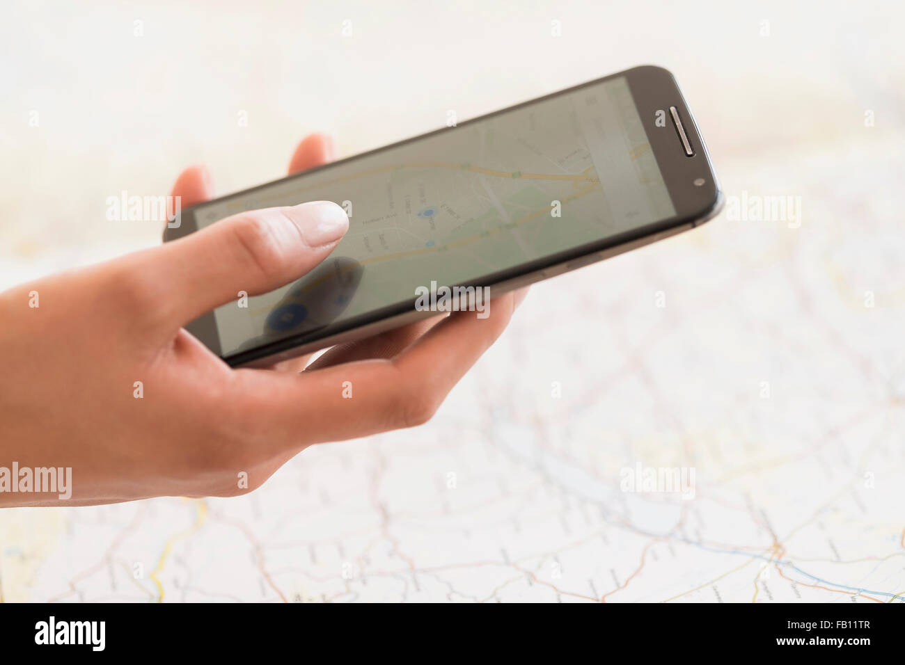 Person holding map hi-res stock photography and images - Alamy