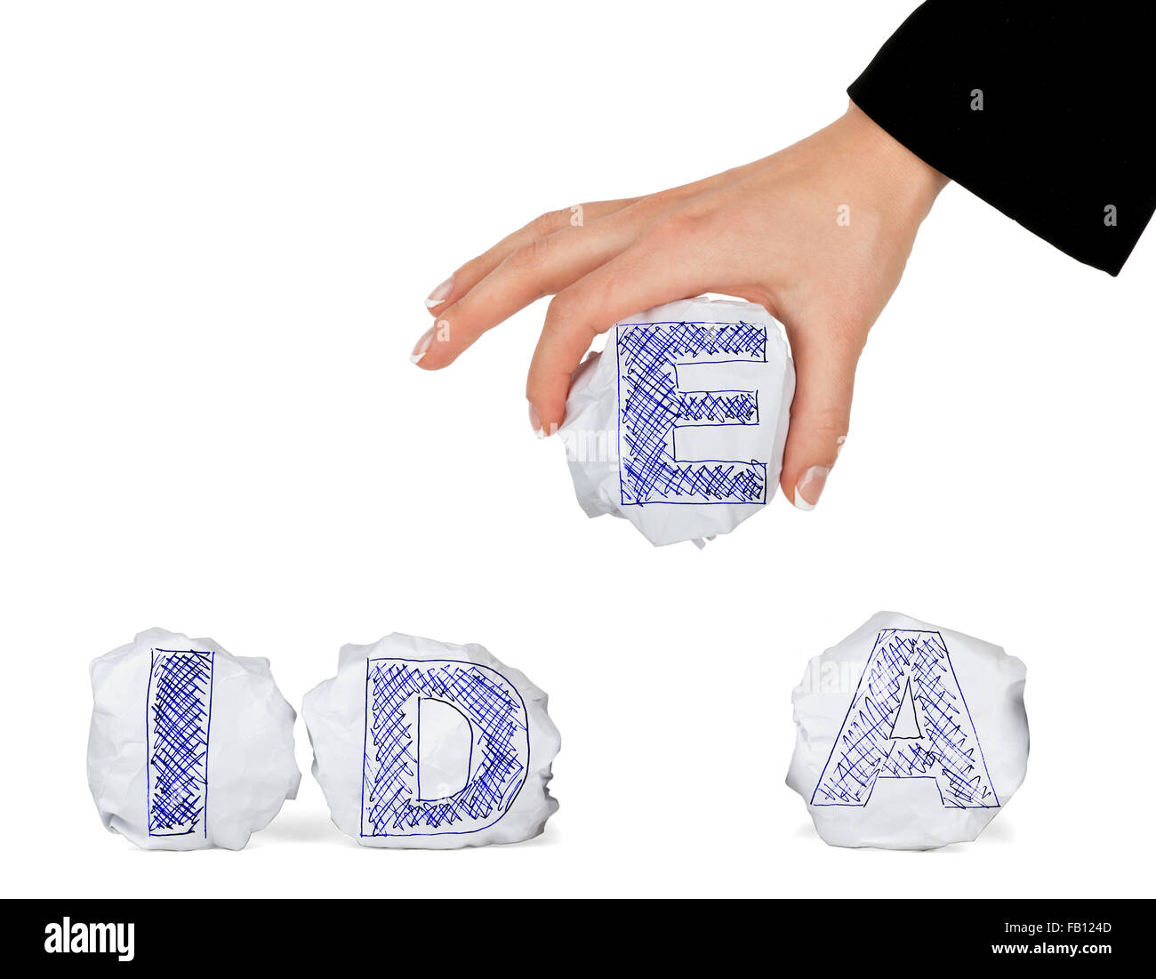 Hand holding crumbled paper ball with letter Stock Photo - Alamy