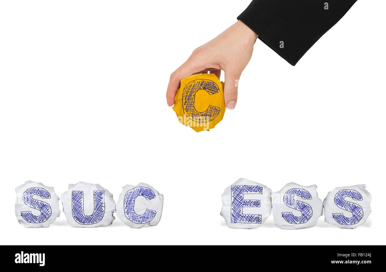 Hand holding crumbled paper ball with letter Stock Photo - Alamy