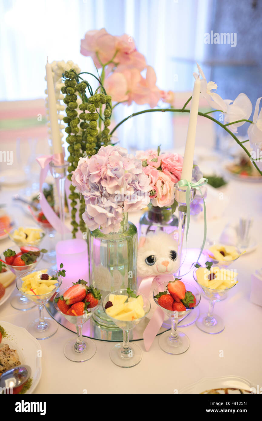 Banquet birthday table setting on evening reception Stock Photo - Alamy