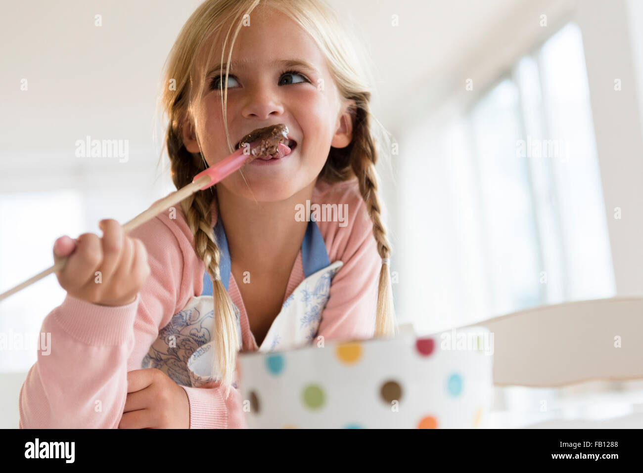 Licking icing hi-res stock photography and images - Alamy