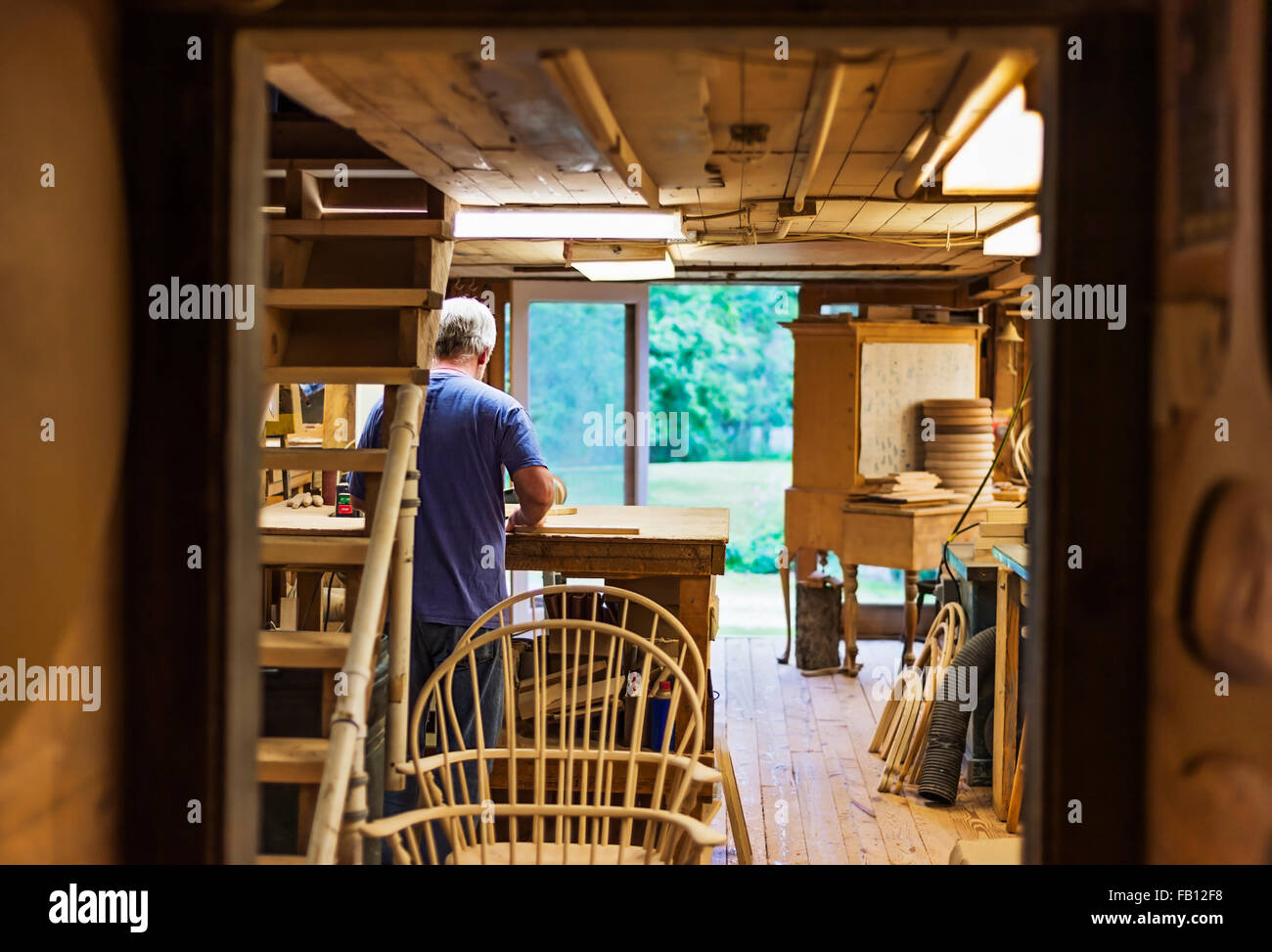 Carpenter in workshop Stock Photo - Alamy