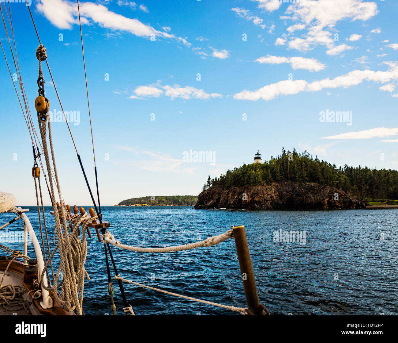 Sailing Boat On Ocean Lighthouse On High Resolution Stock Photography ...