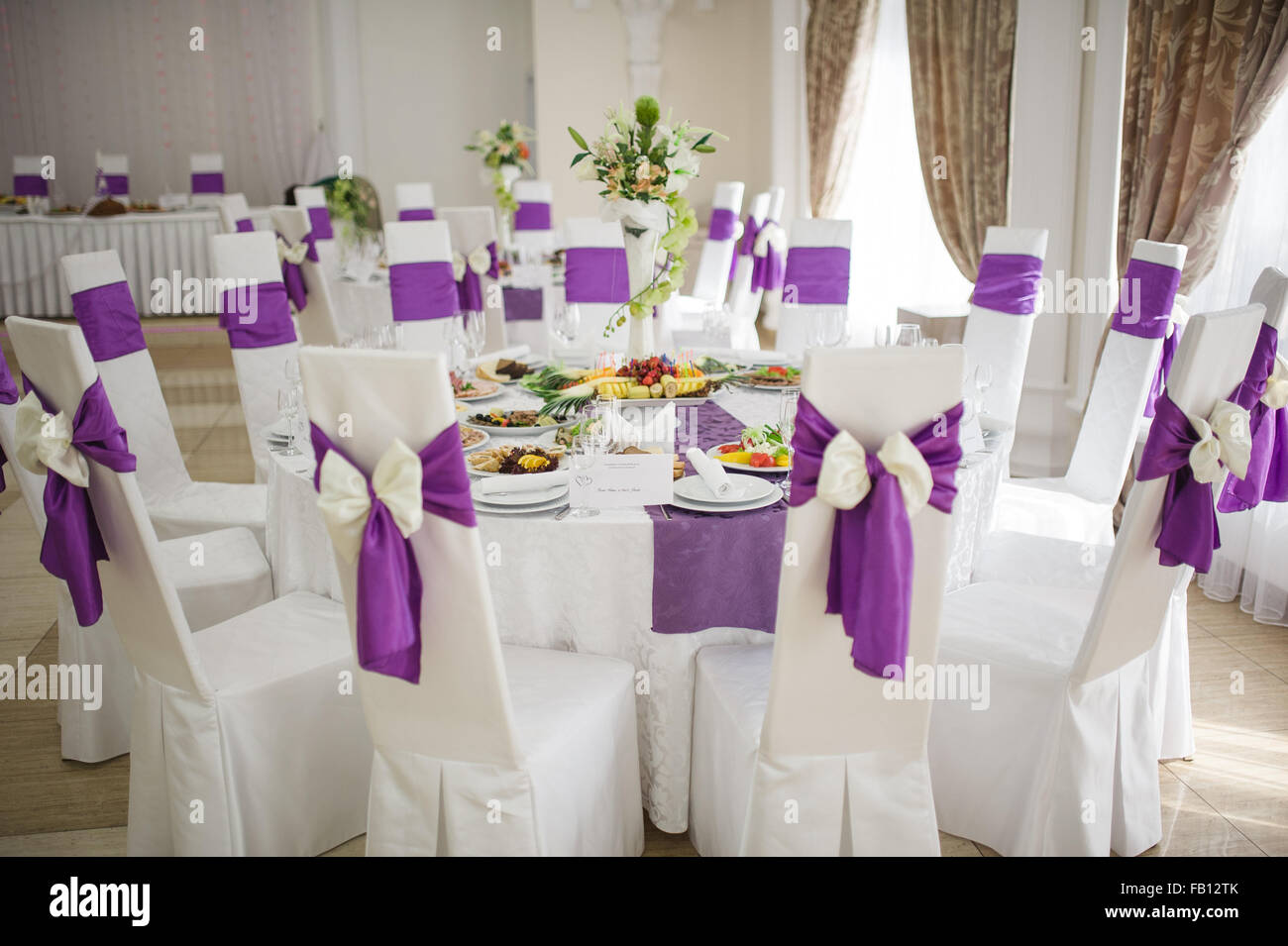 Banquet wedding table setting on evening reception Stock Photo - Alamy