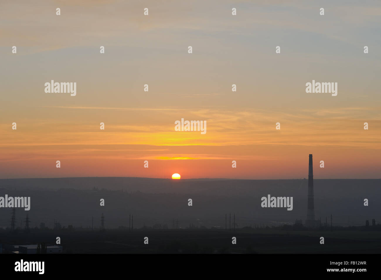 Silhouettes Sunset in the City nice sun Stock Photo - Alamy