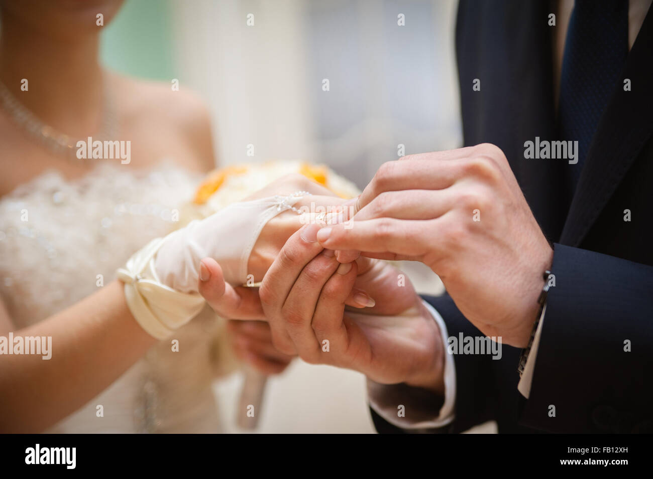bride and groom are changing rings on wedding Stock Photo - Alamy