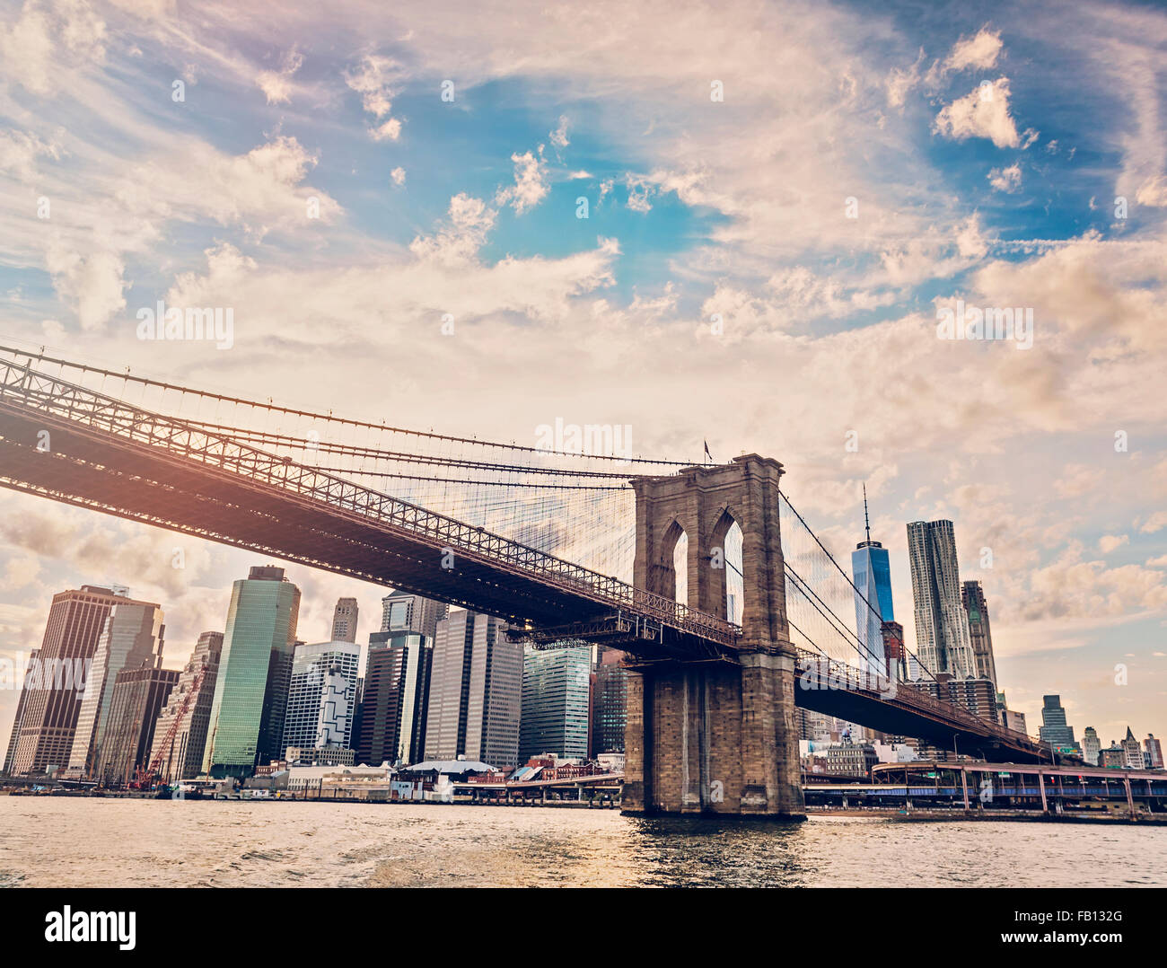 Brooklyn Bridge over Hudson River with Financial district in background ...