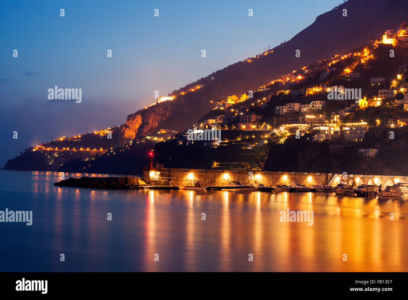 Illuminated town at night Stock Photo - Alamy
