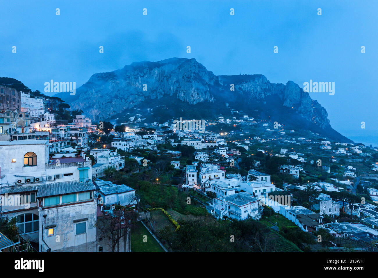 Town at dusk Stock Photo - Alamy