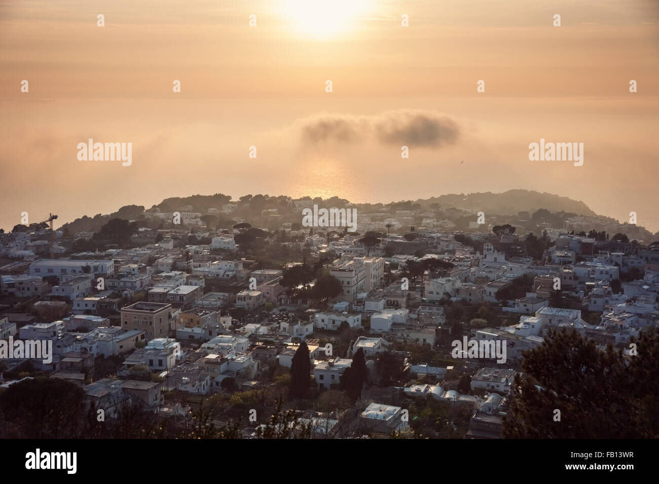 Town at sunset Stock Photo - Alamy