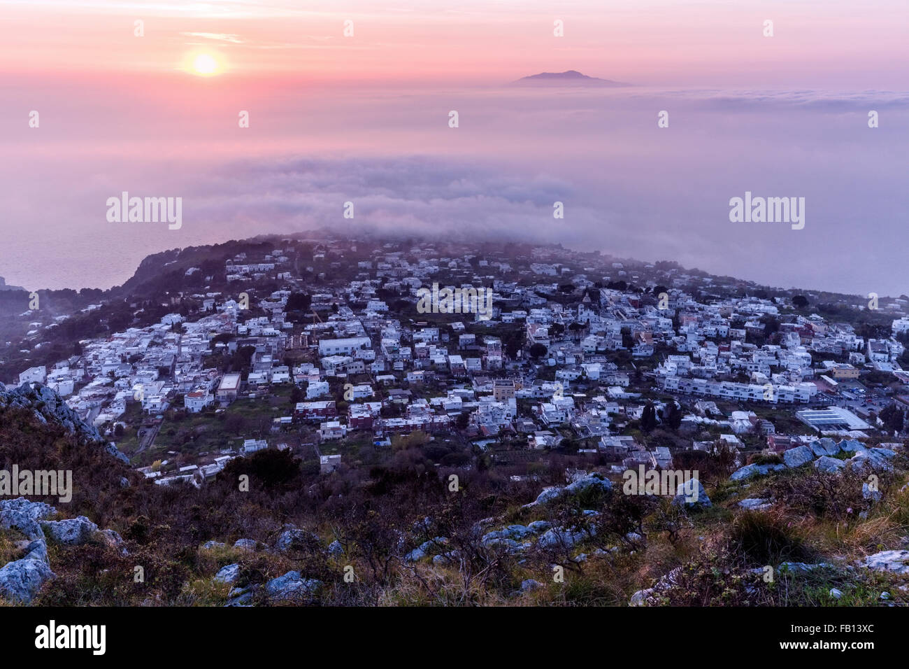 Town at sunset Stock Photo - Alamy