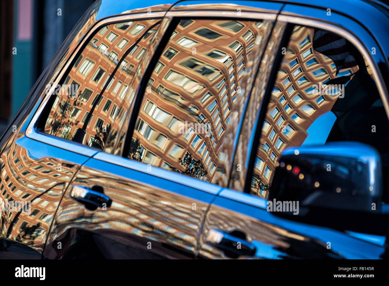 Building reflected in car Stock Photo - Alamy