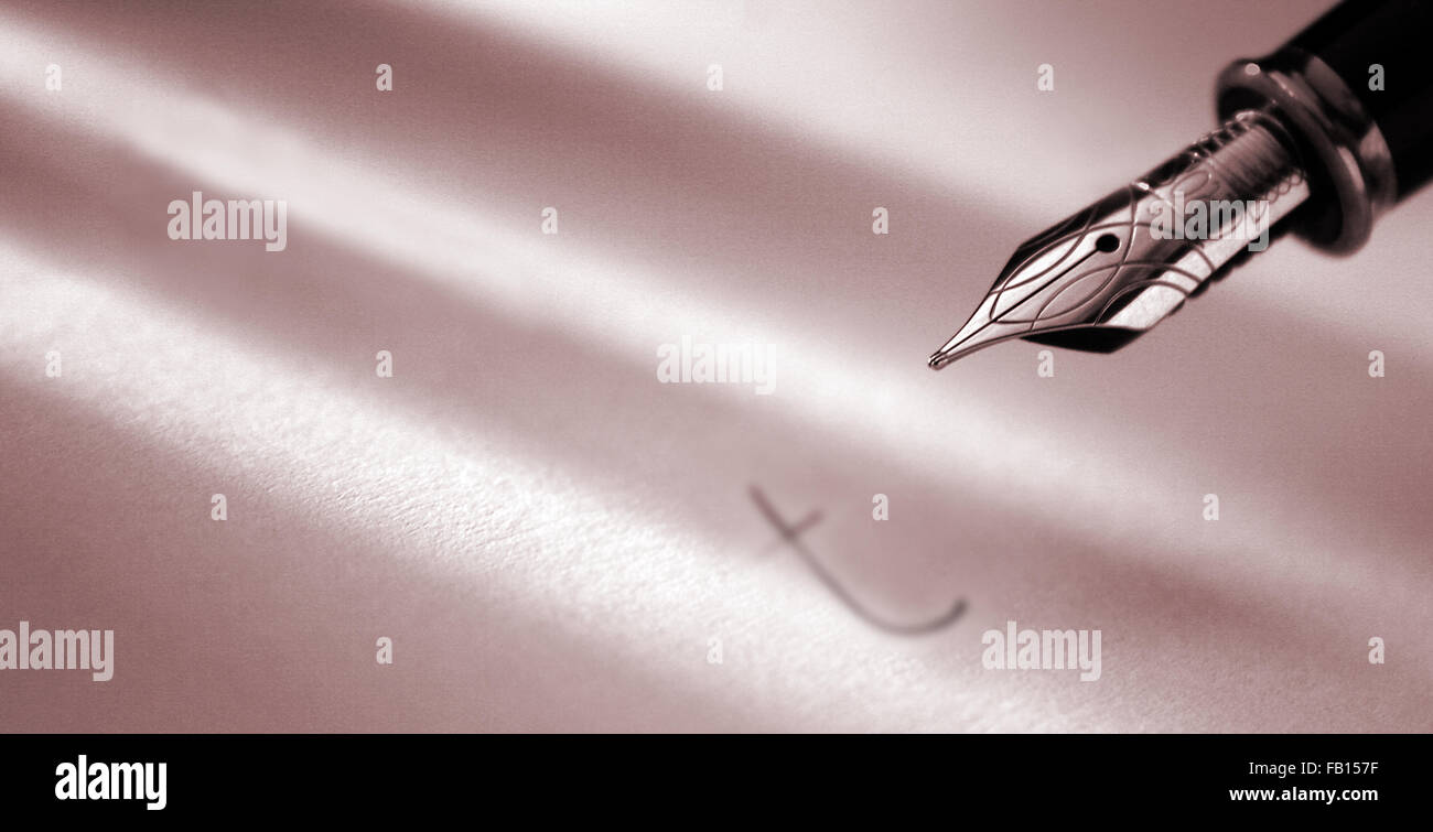Detail of a fountain pen writing the letter T Stock Photo - Alamy