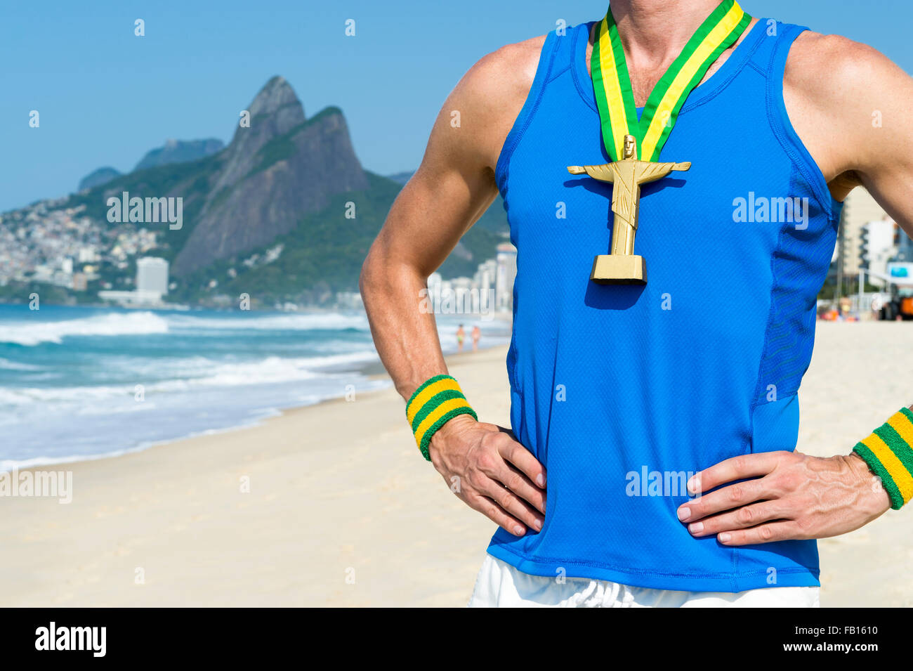 Brazilian athlete standing with religious gold medal in the form of a ...
