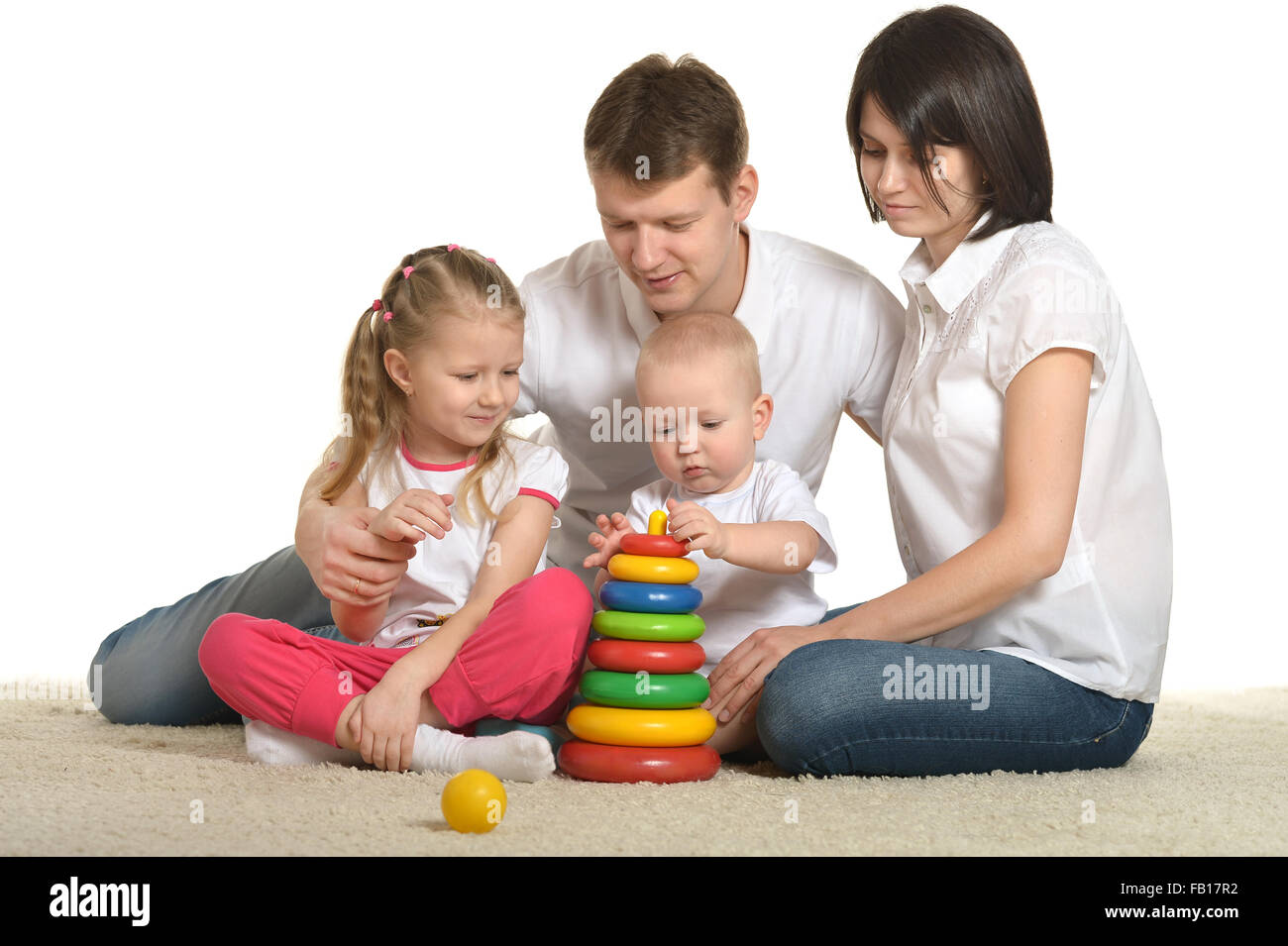 family playing isolated on white Stock Photo - Alamy