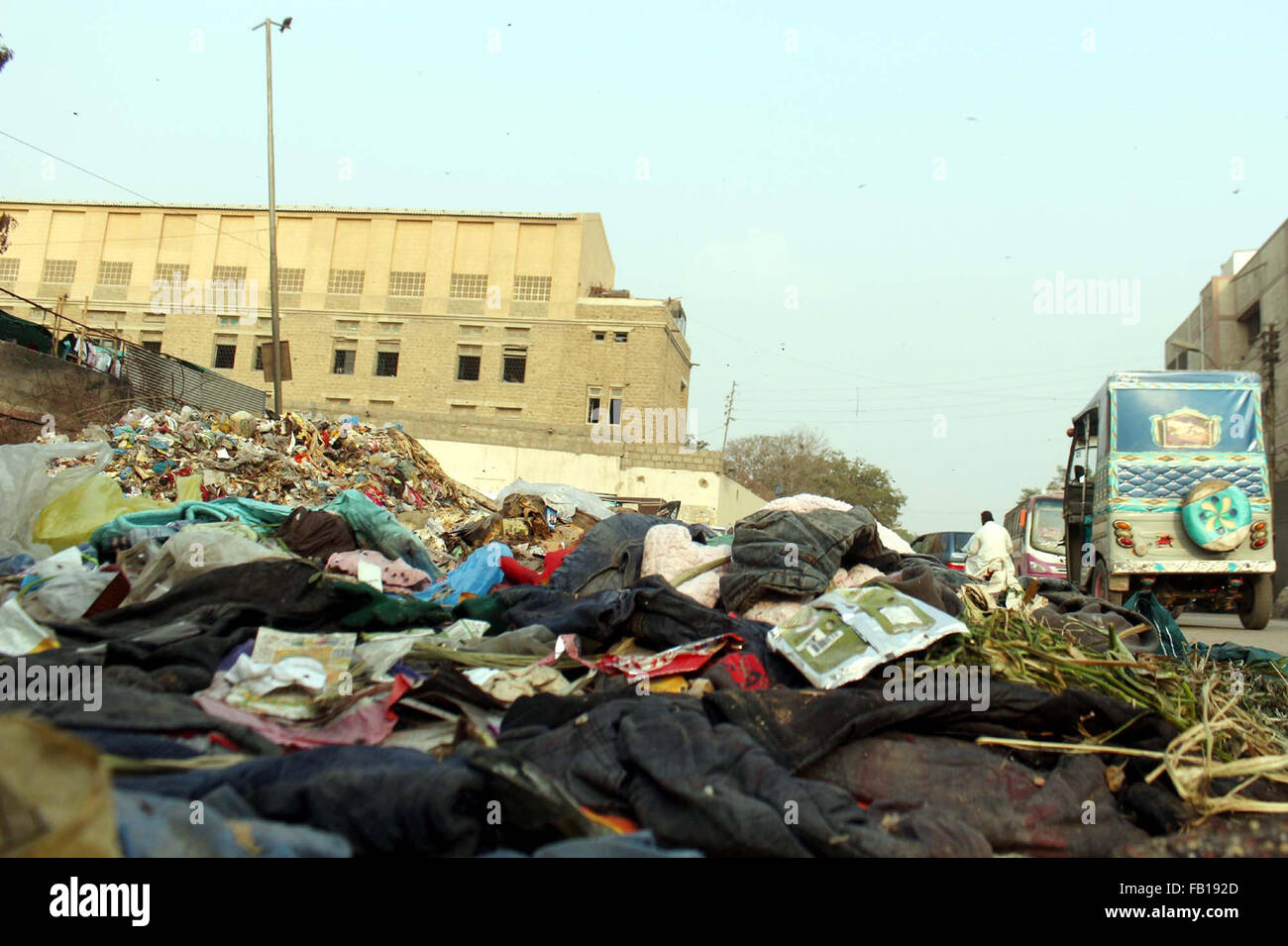 View of huge heap of garbage litter down behind Sindh Secretariat ...