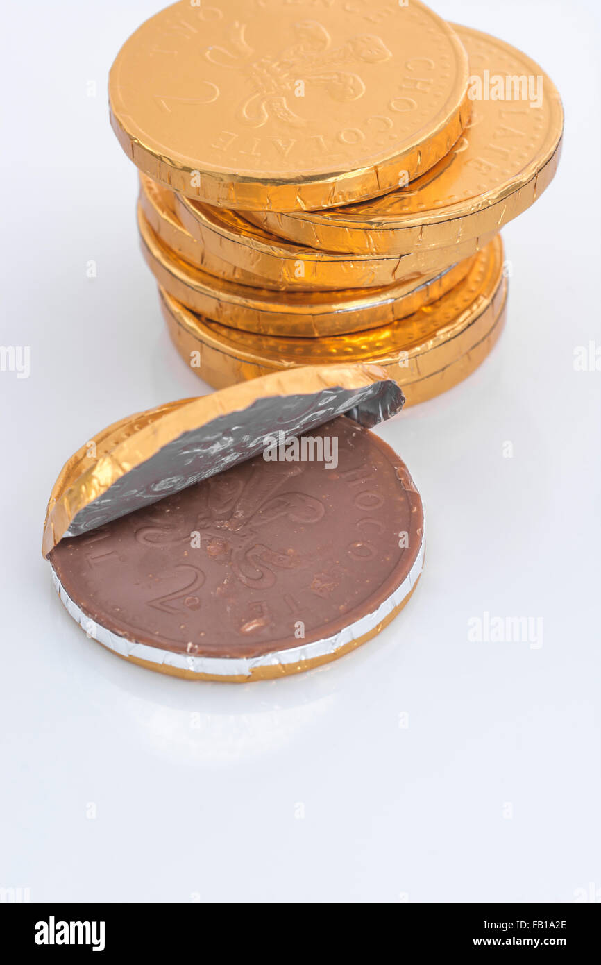 Stack of chocolate money covered in fake gold foil. Supposed to be UK ...