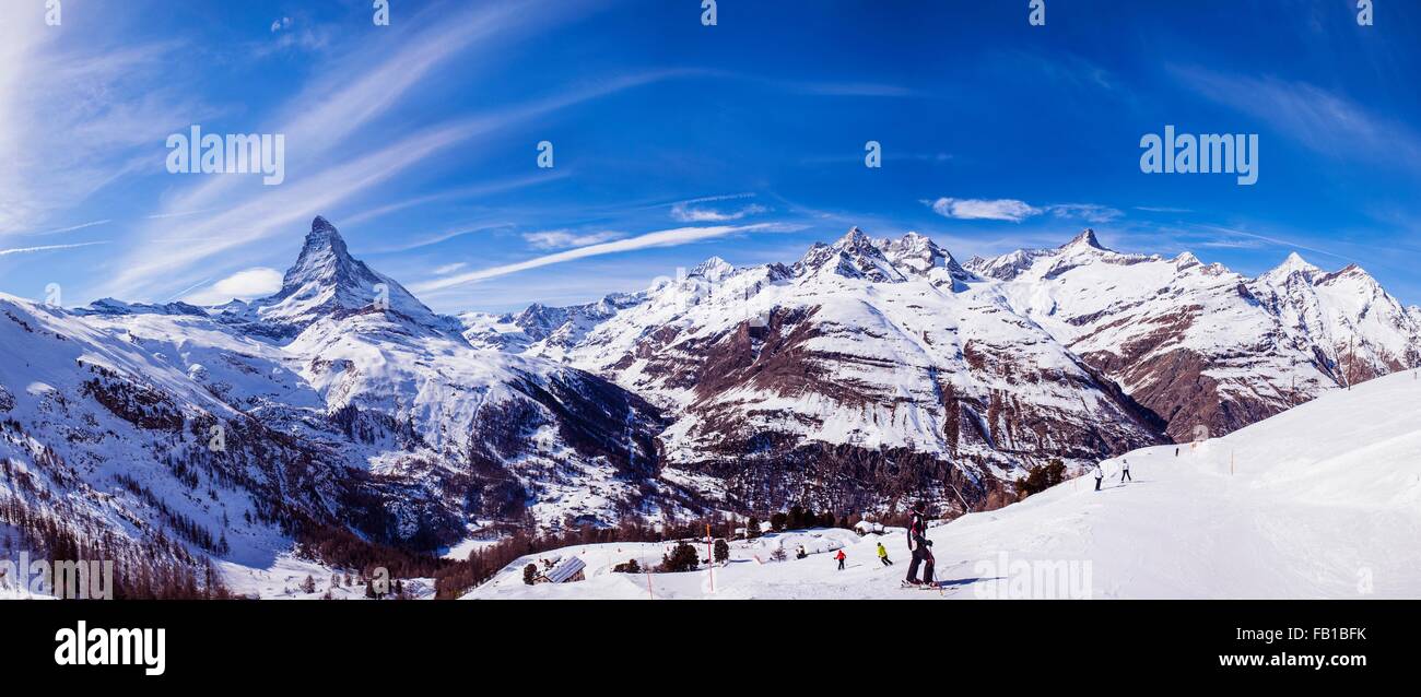 Panoramic view of ski slopes and skiers, Zermatt, Switzerland Stock ...