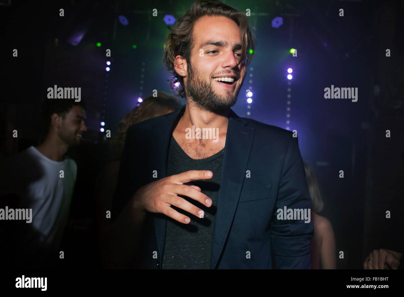 Young man having fun in club Stock Photo - Alamy