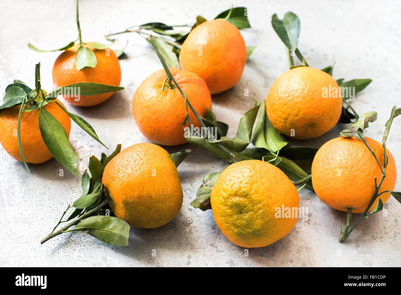 Oranges with leaves hi-res stock photography and images - Alamy