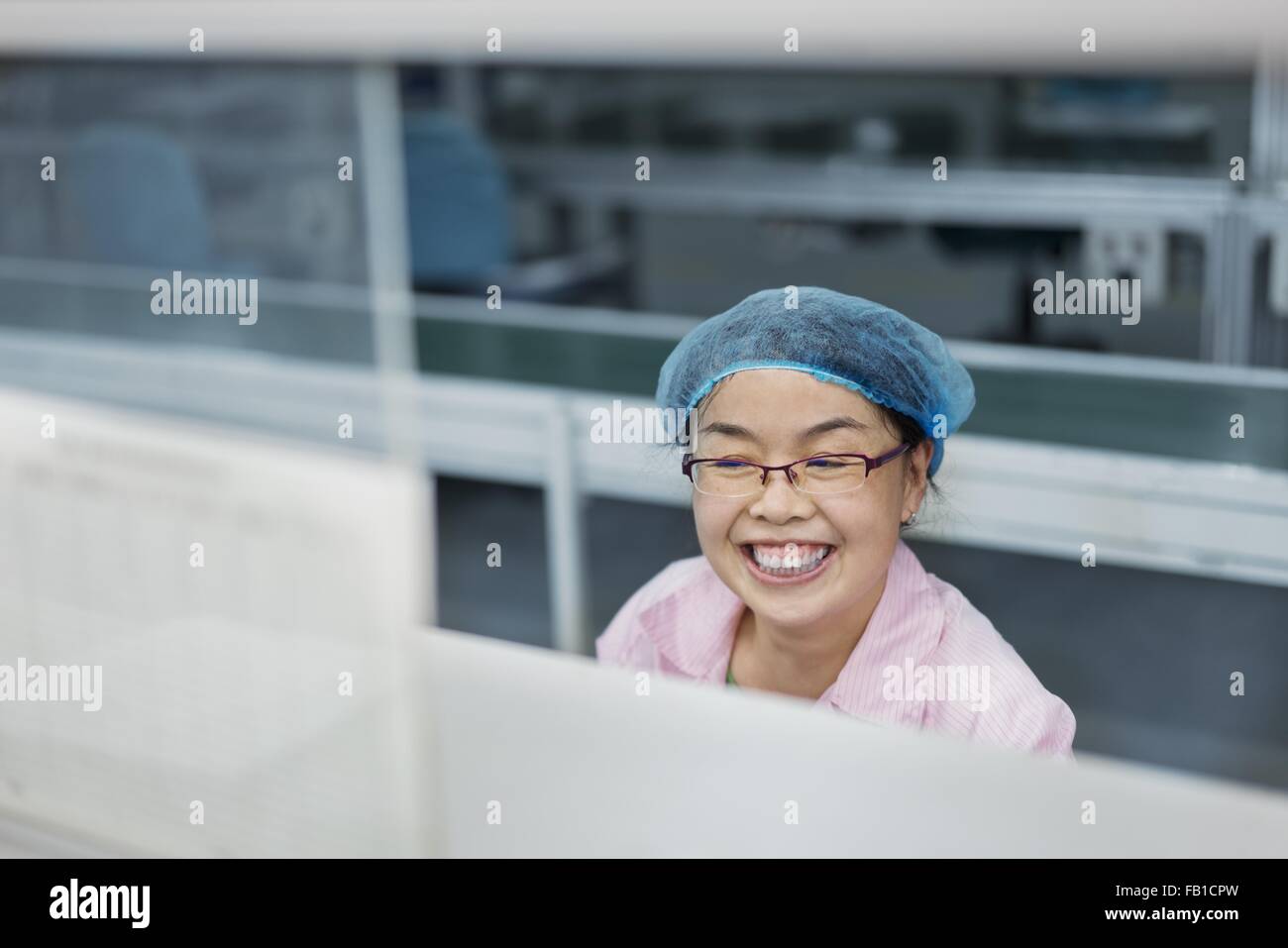 Female worker in solar panel assembly factory, Solar Valley, Dezhou ...