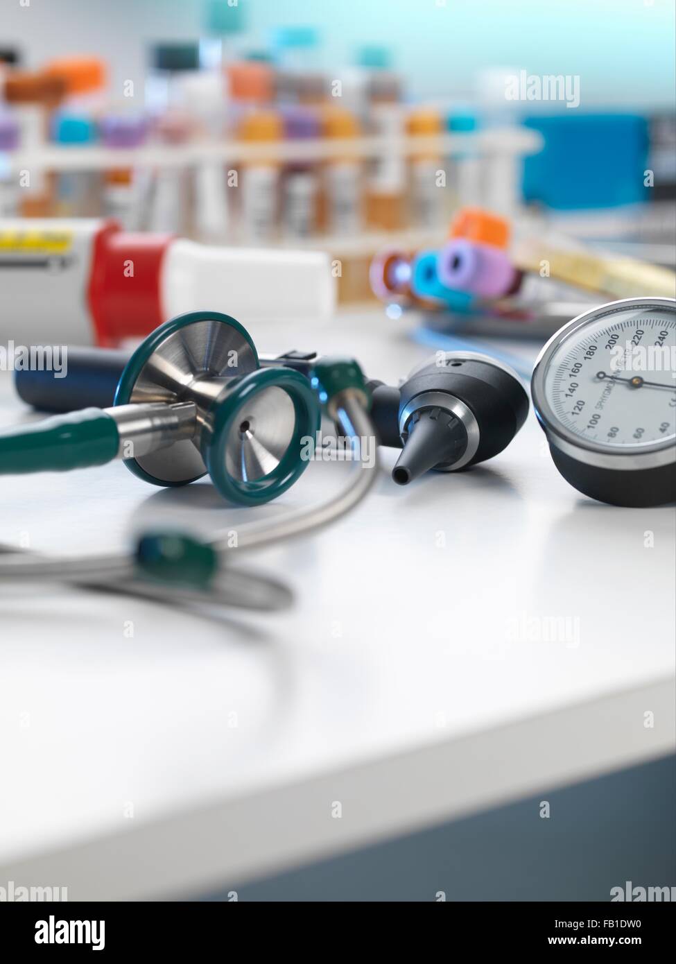 Stethoscope, auriscope, blood pressure gauge on desk Stock Photo - Alamy
