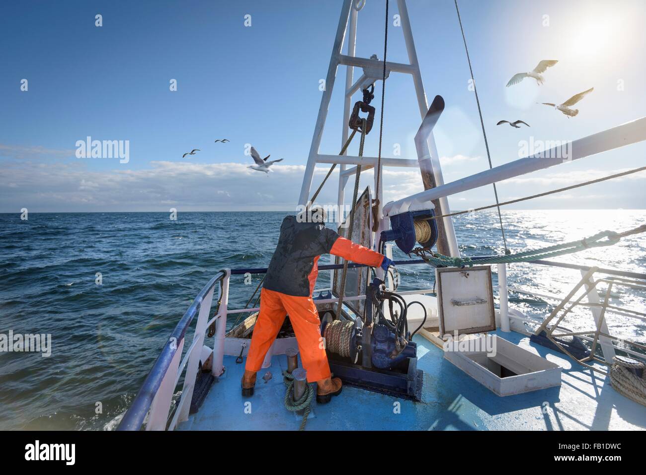Fisherman rear view hi-res stock photography and images - Alamy