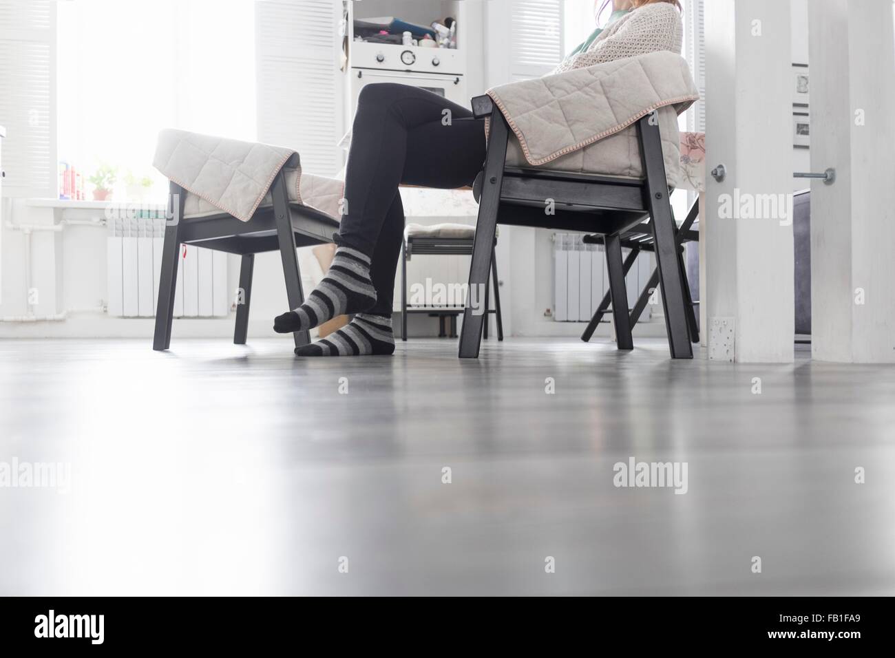 Sitting in chair hi-res stock photography and images - Alamy