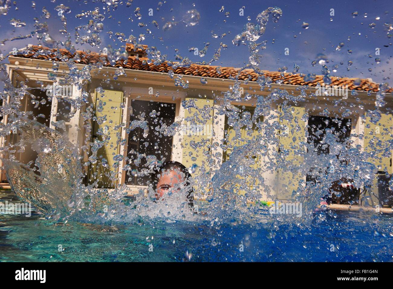 Person swimming in pool blue hi-res stock photography and images - Alamy