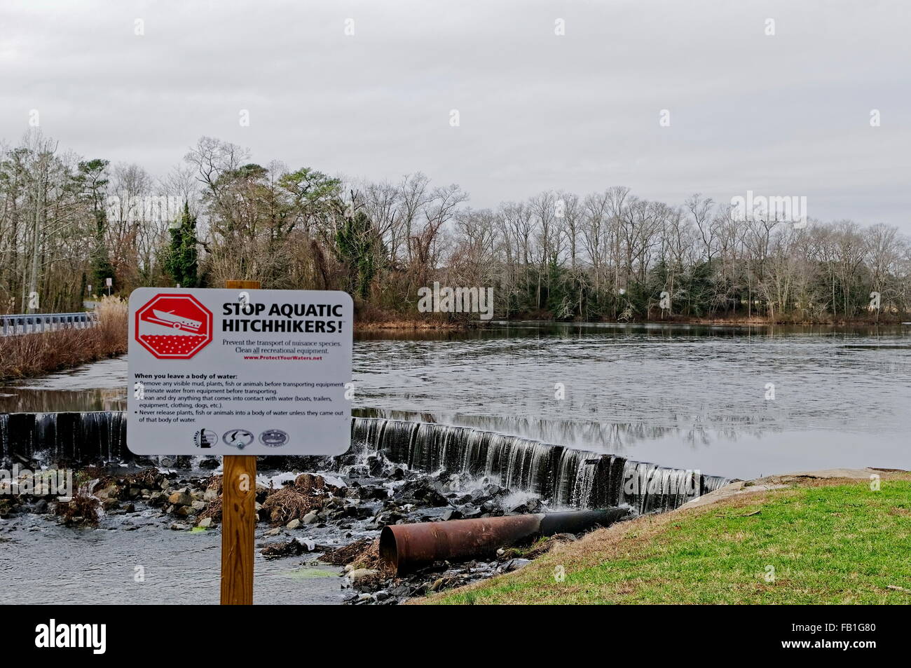 A sign alerts sportsman to beware hitchhiking invasive species attached ...