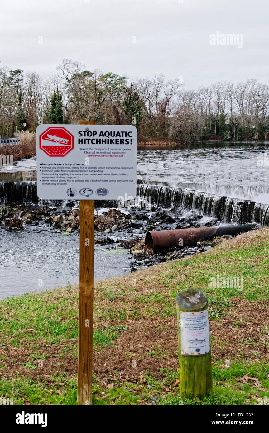 A sign alerts sportsman to beware hitchhiking invasive species attached ...