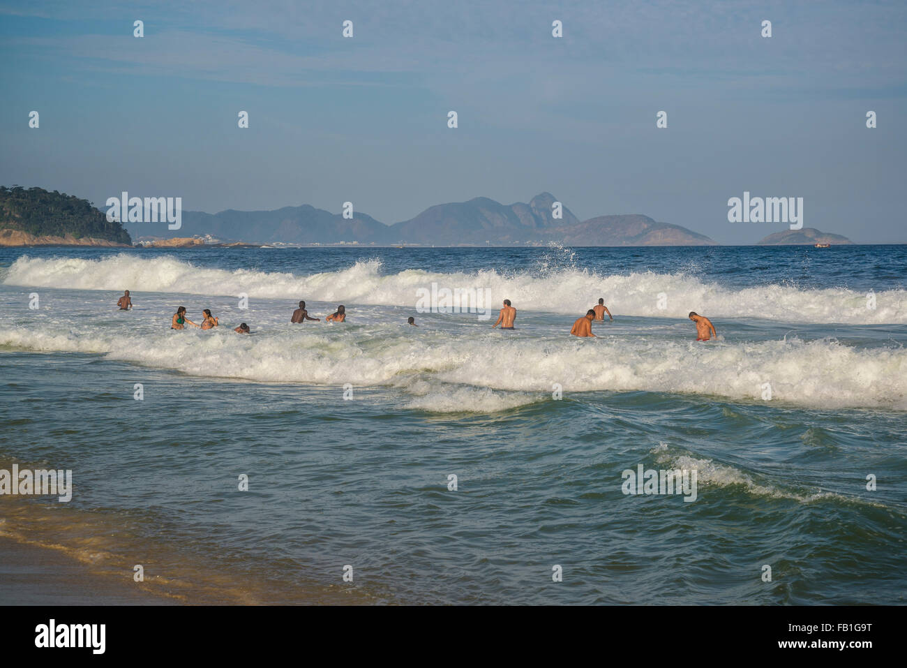 People swimming in the ocean, Copacabana beach, Rio de Janeiro, Brazil ...