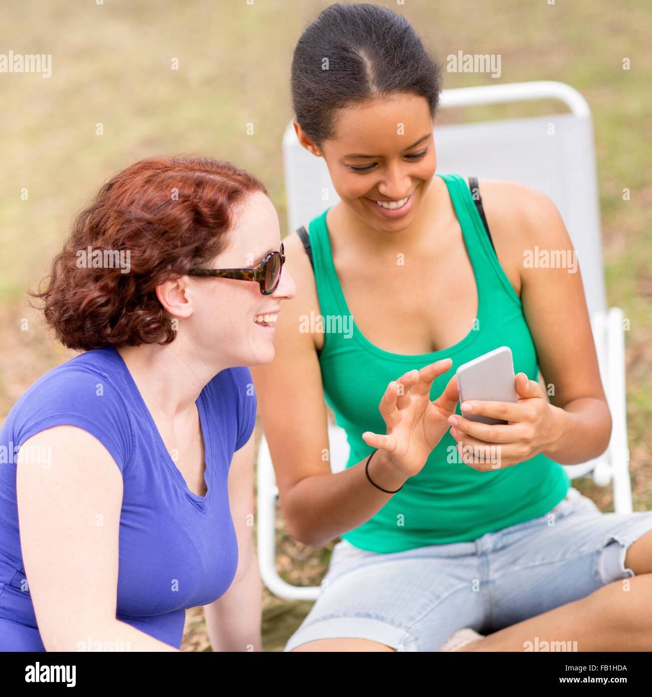 Woman crossed legs hi-res stock photography and images - Alamy