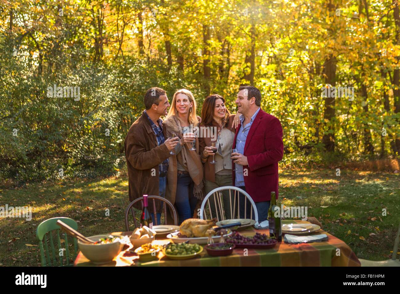 Two couples and talking hi-res stock photography and images - Alamy