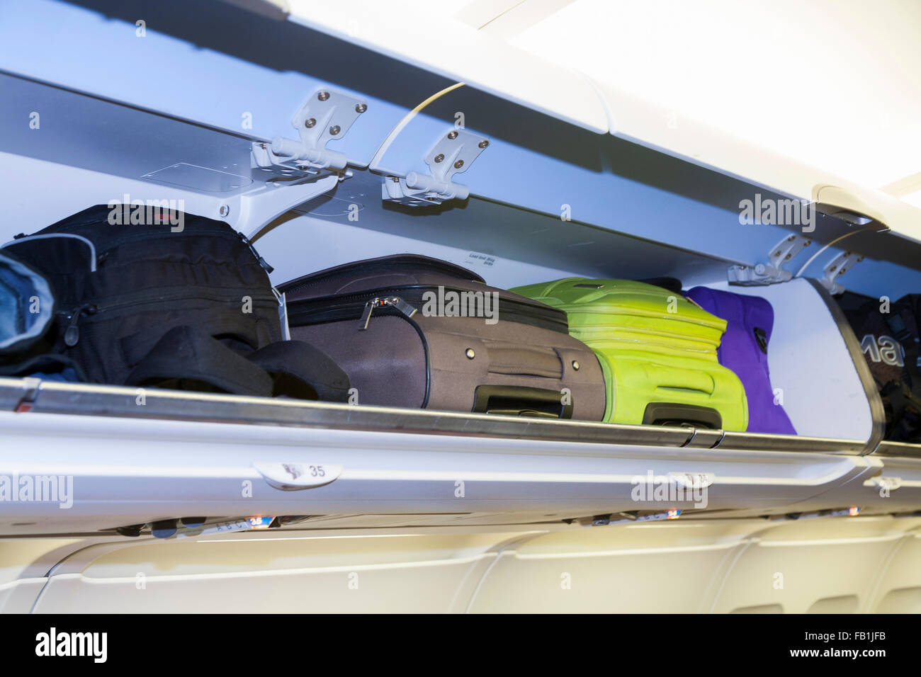 Carry on luggage bag passenger locker High Resolution Stock Photography ...